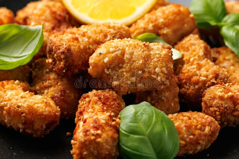 Crispy Breaded Scampi Nuggets with Sauce on Plate Stock Image - Image ...