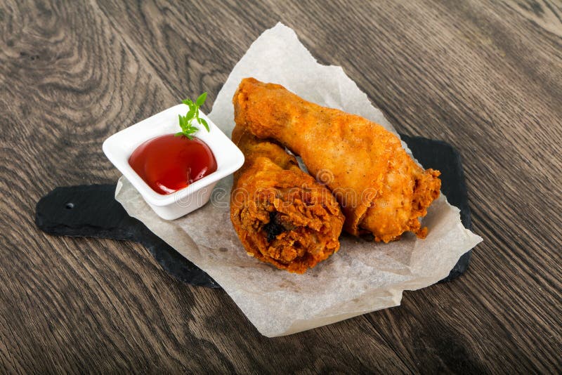 Crispy chicken legs stock image. Image of baked, poultry - 142381273