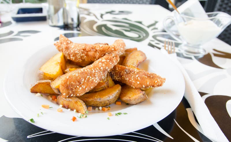 Crispy Chicken with Potatoes Stock Photo - Image of potatoes, battered ...