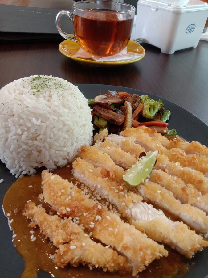Crispy Chicken Rice with Broccoli and Mushrooms Stock Image - Image of ...