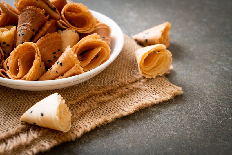 Crispy Coconut Roll - Asian Snack Stock Photo - Image of black, rolls ...