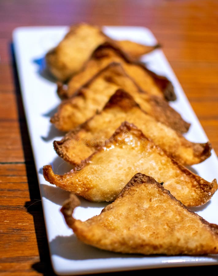 Crispy Crab Rangoon on a Ceramic Plate Stock Photo - Image of food ...