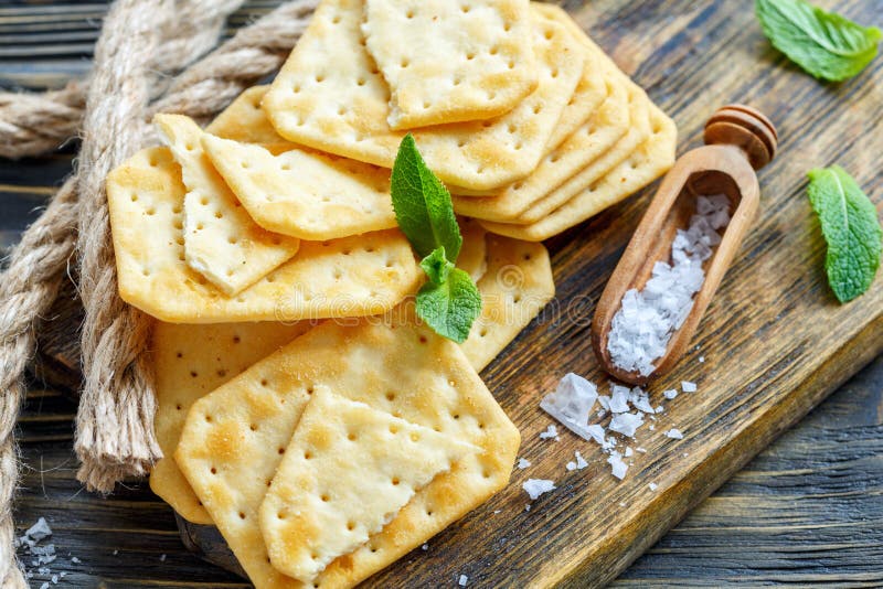Crispy Cracker and Scoop with Sea Salt. Stock Photo - Image of ...