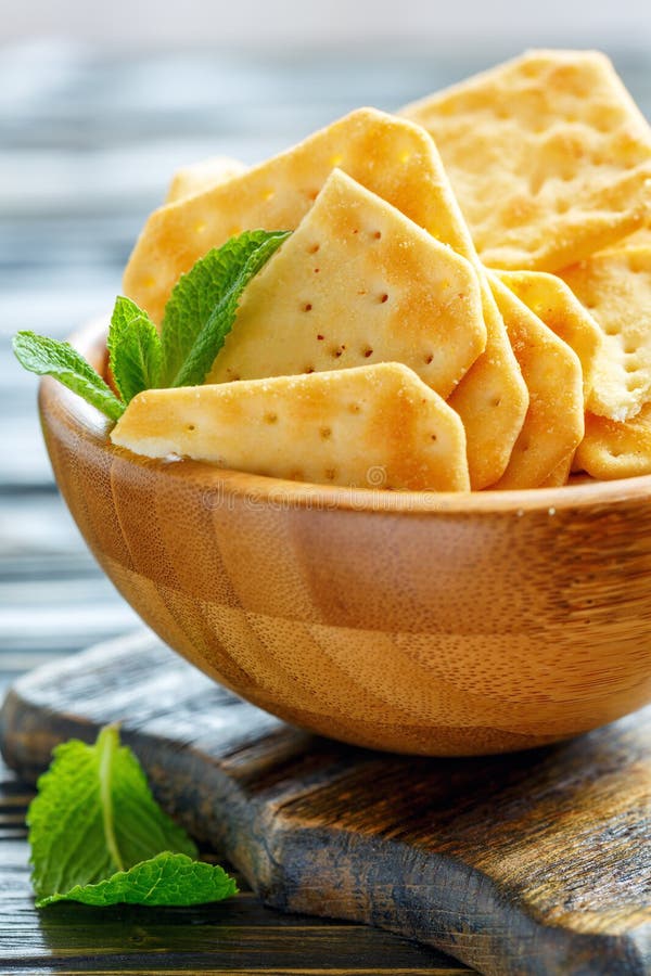 Crispy Crackers with Salt in a Bowl. Stock Photo - Image of wooden ...
