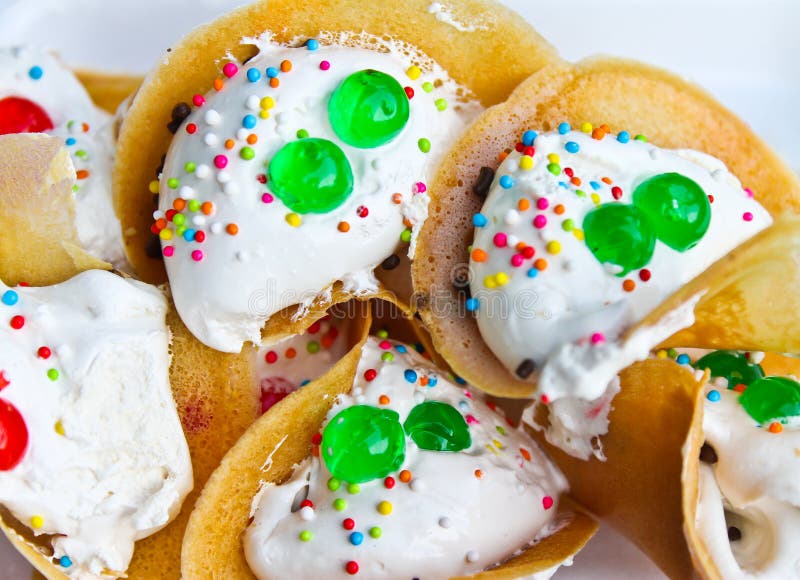 Crispy Crepes are Being Made in the Market.Making Dessert Stock Image ...