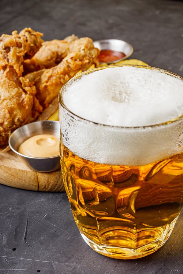 Crispy Deep-fried Chicken Drumsticks on a Black Background Stock Photo ...