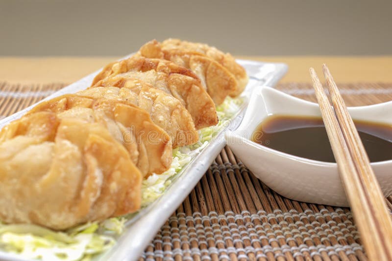 Crispy Deep Fried Dumplings Served with Chopsticks and Sauce Stock ...