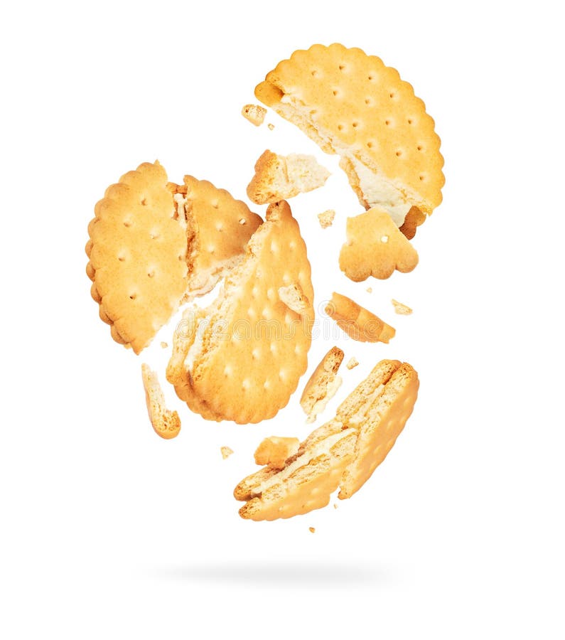Crispy Delicious Biscuits Crushed into Pieces in the Air on a White ...
