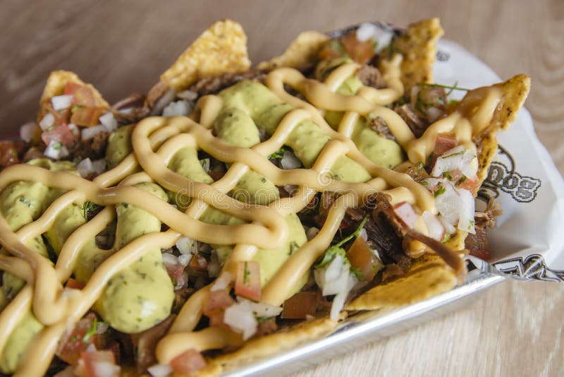 Crispy and Delicious Plate of Nachos with Sauce Stock Photo - Image of ...