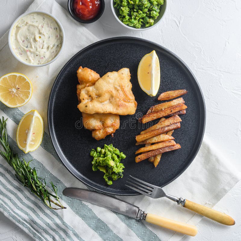 Crispy Fish and Chips with Battered Cod and Fries and a Side of Tartar ...