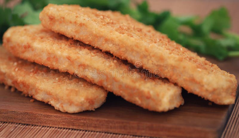 Crispy fish fillet stock image. Image of tomato, fish - 299730519