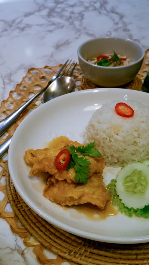 Crispy Fish Rice with Sweet and Sour Sauce Stock Image - Image of dish ...