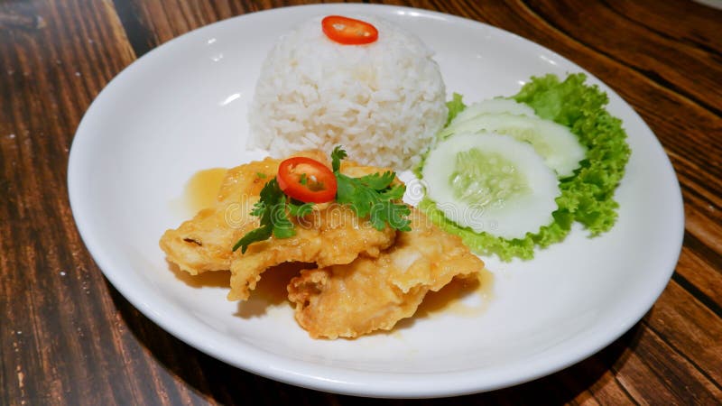 Crispy Fish Rice with Sweet and Sour Sauce Stock Image - Image of spicy ...