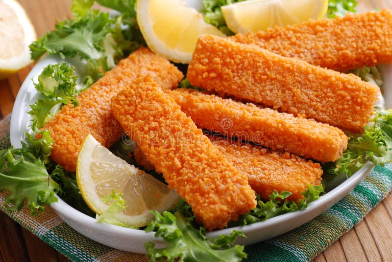 Crispy fish sticks stock photo. Image of lemon, cooking - 34760844