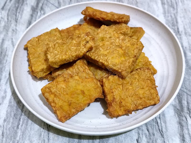Crispy flour fried tempeh. stock image. Image of fermentation - 365092835