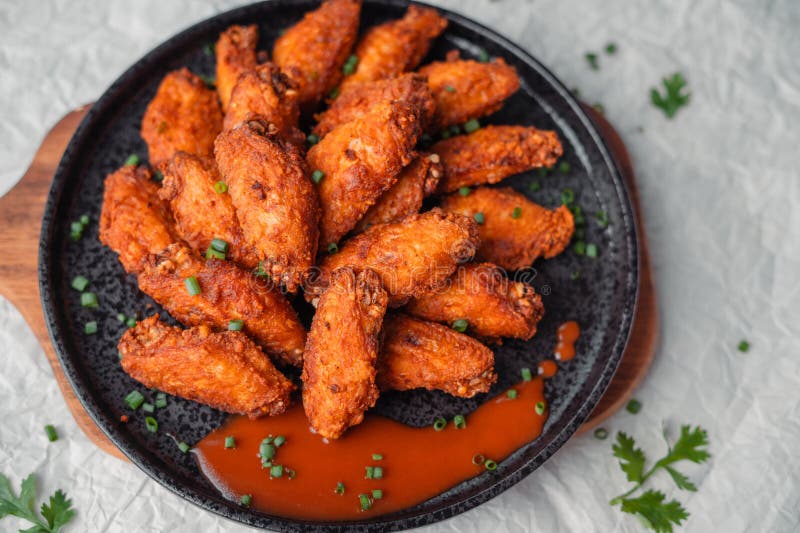 Crispy Fried Chicken on a Black Plate Stock Photo - Image of sauce ...