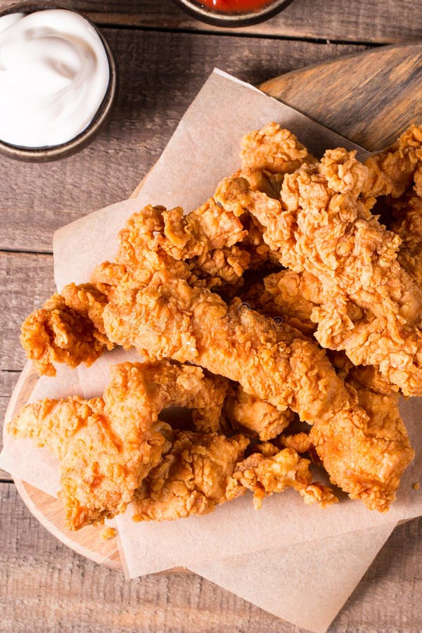 Crispy Fried Chicken Breast Strips with Sauce Stock Photo - Image of ...