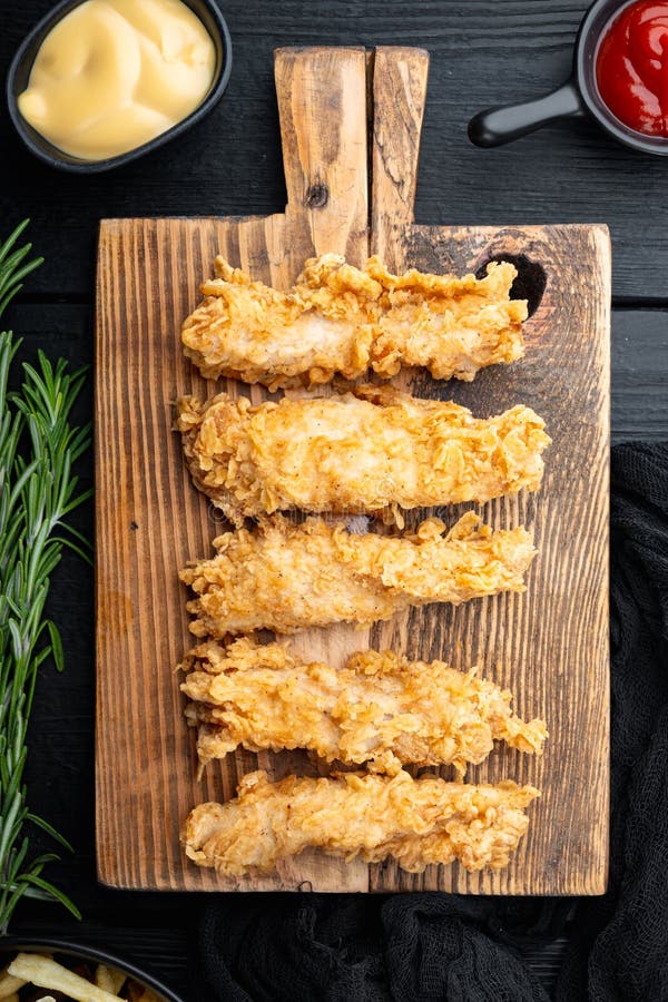Crispy Fried Chicken Broast on Black Wooden Table, Top View Stock Image ...