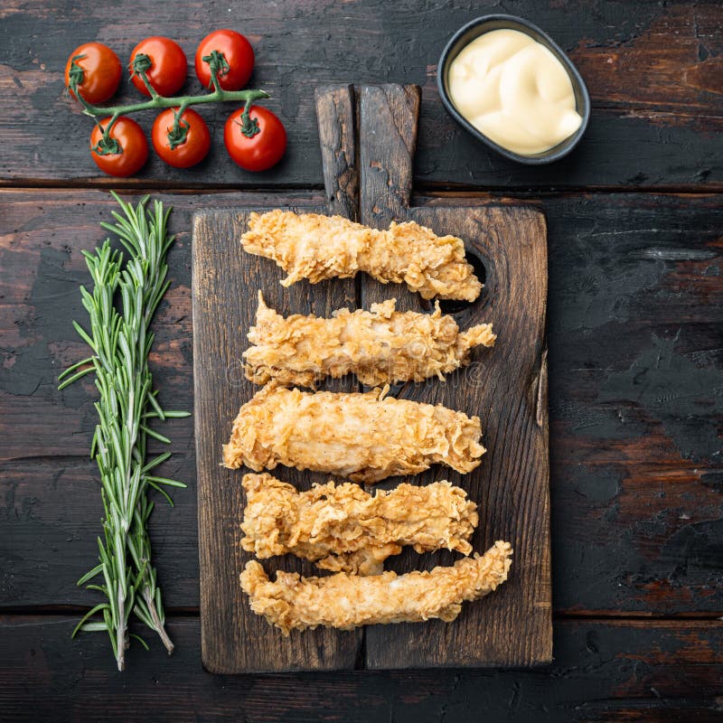 Crispy Fried Chicken Broast on Old Dark Wooden Table, Top View Stock ...