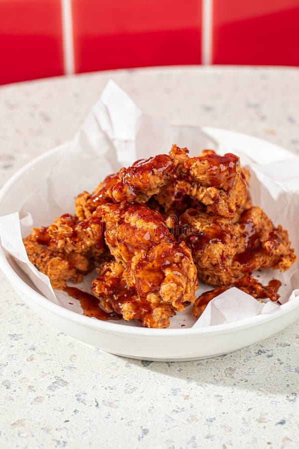 Crispy Fried Chicken Thighs with Red Sauce Stock Photo - Image of ...