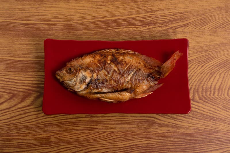 Crispy fried fish stock photo. Image of eating, gourmet - 305922240