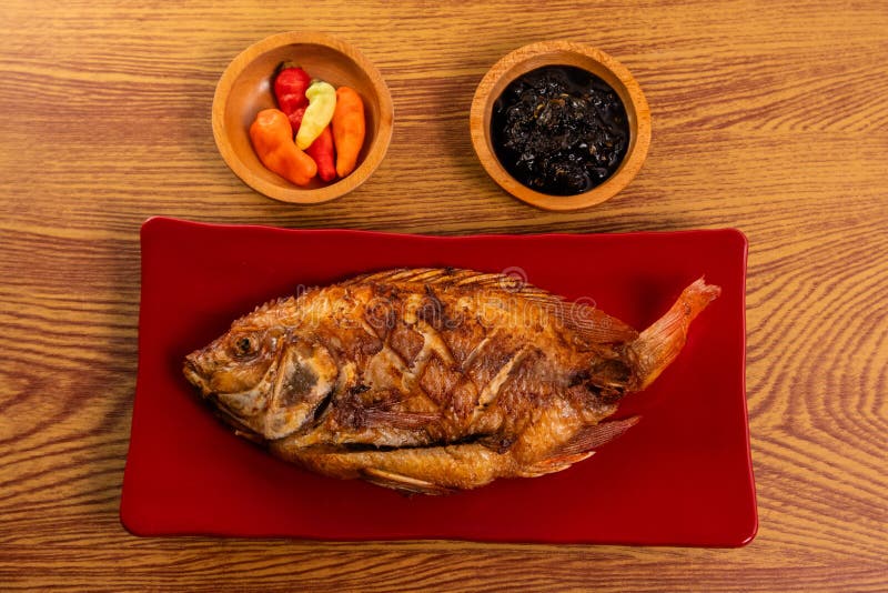 Crispy fried fish stock image. Image of basil, fish - 305922835