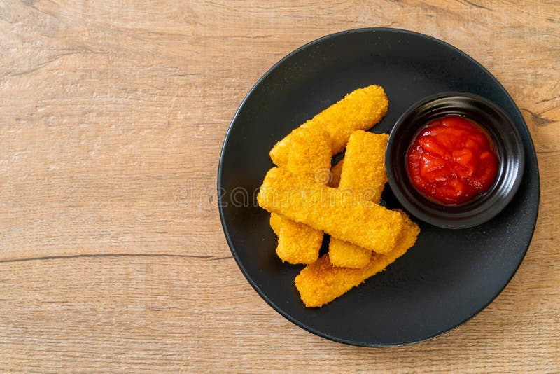 Crispy Fried Fish Fingers with Breadcrumbs Served on Plate Stock Image ...