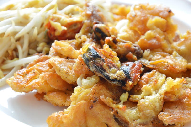 Crispy Fried Mussel Omelet with Bean Sprout on Dish Stock Photo - Image ...