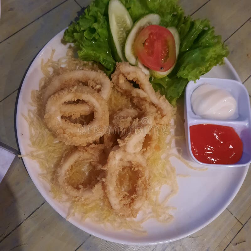 Crispy Fried Squid with Lemon is Very Delicious Stock Image - Image of ...