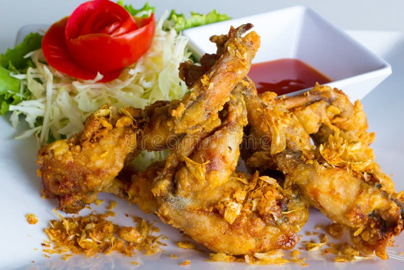 Crispy frog legs stock image. Image of sauce, delicious - 42985041
