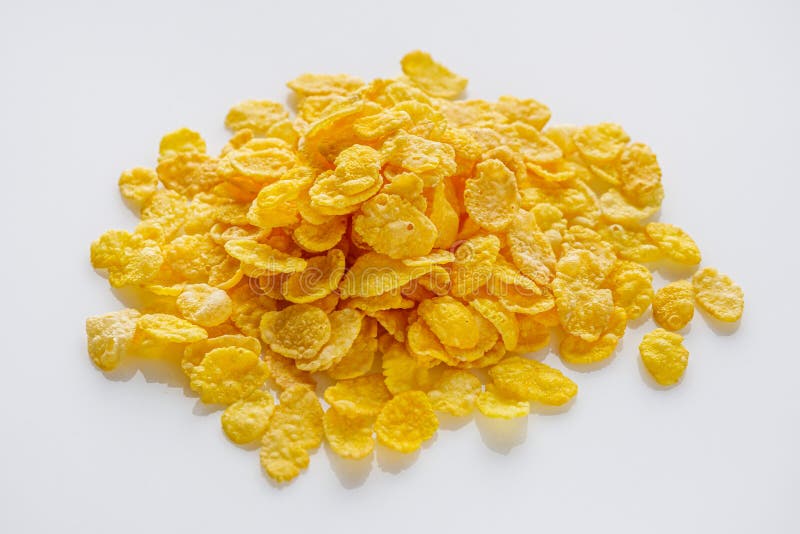Crispy Golden Cornflakes on a White Acrylic Background Stock Image ...