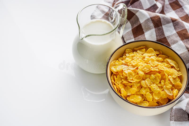 Crispy Golden Cornflakes on a White Acrylic Background Stock Photo ...