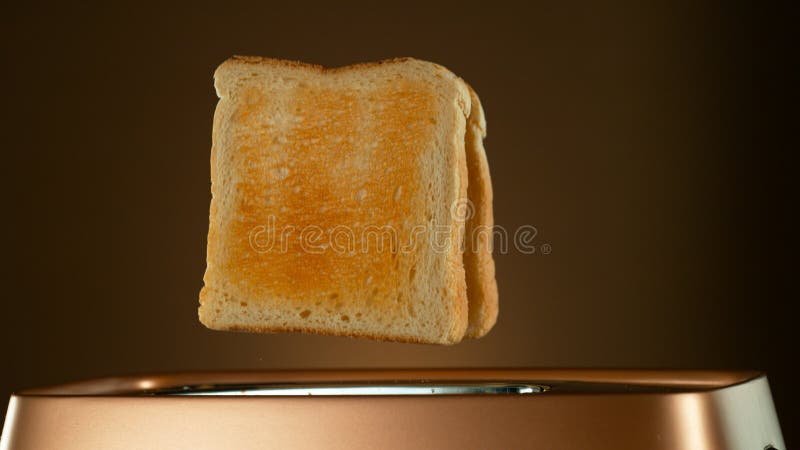Crispy Golden Toasts Jumping Out of Toaster Stock Image - Image of ...