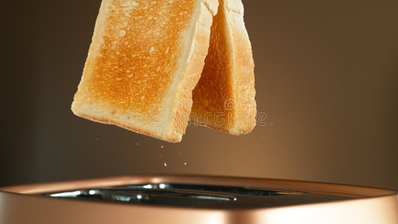 Crispy Golden Toasts Jumping Out of Toaster Stock Photo - Image of ...