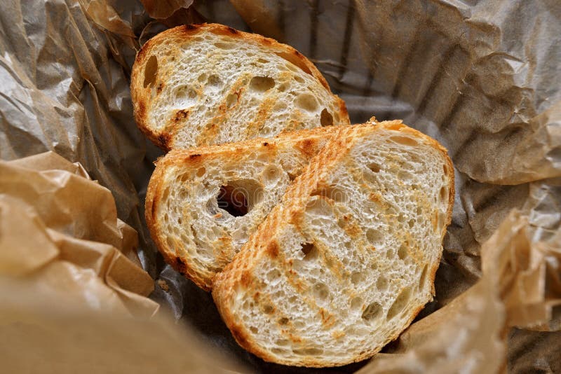Crispy Grilled White Bread Toasts on Craft Paper Stock Photo - Image of ...