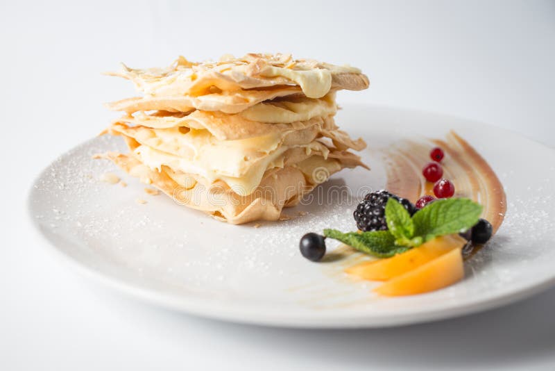 Crispy Napoleon with Almond Chips and Berries and Mint Stock Image ...