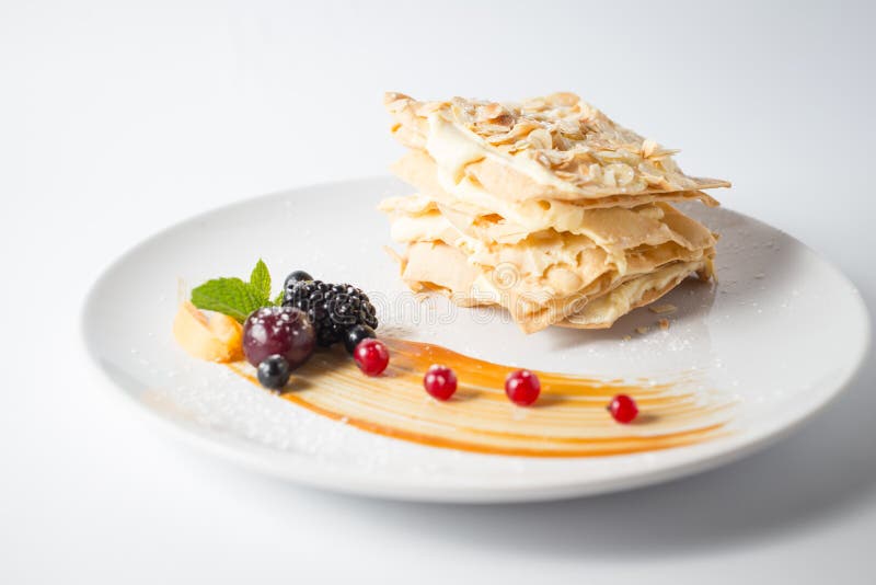Crispy Napoleon with Almond Chips and Berries and Mint Stock Image ...
