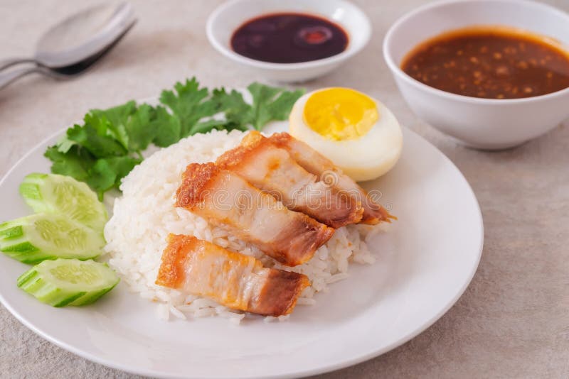 Crispy Pork with Rice on Plate and Sauce in Bowl Stock Image - Image of ...