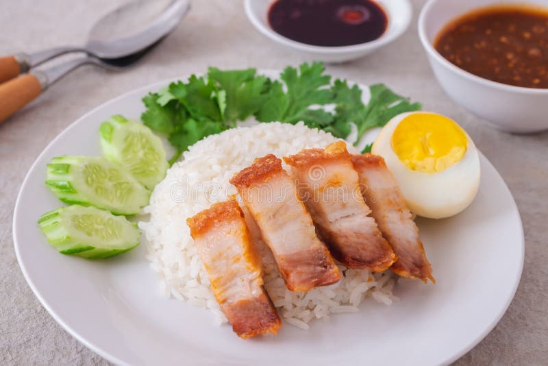 Crispy Pork with Rice on Plate and Sauce in Bowl Stock Image - Image of ...