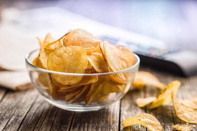 Crispy Potato Chips in Bowl on Wooden Table Stock Image - Image of ...