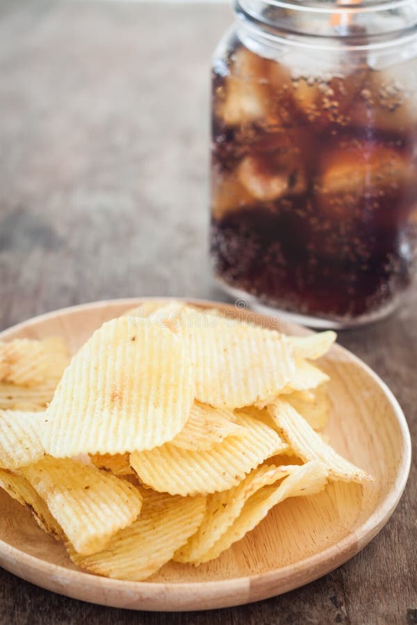 Iced Cola with Potato Chips Stock Photo - Image of crispy, juice: 57292596