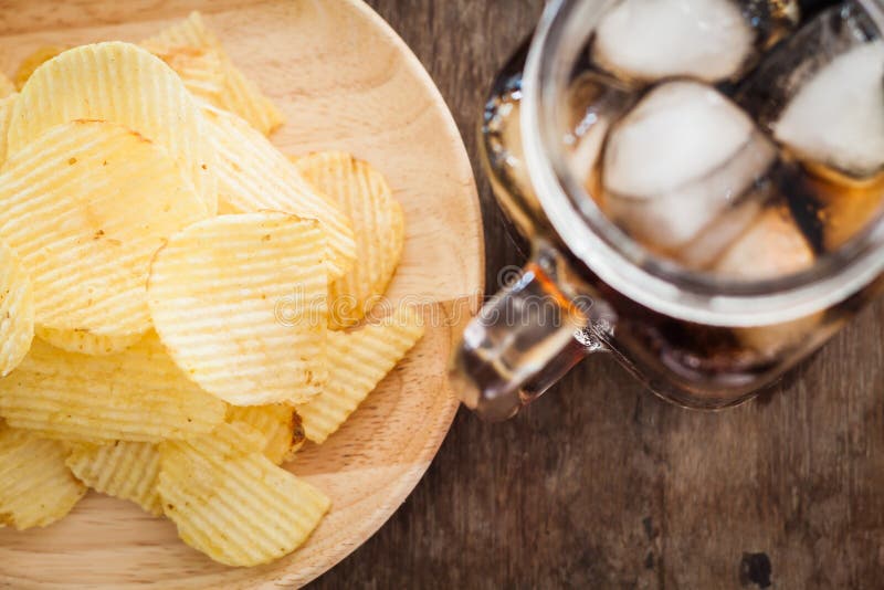 Crispy Potato Chips with Iced Cola Stock Photo - Image of crunchy ...