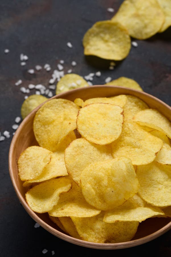Crispy Potato Chips with Salt Stock Photo - Image of food, heap: 241716406