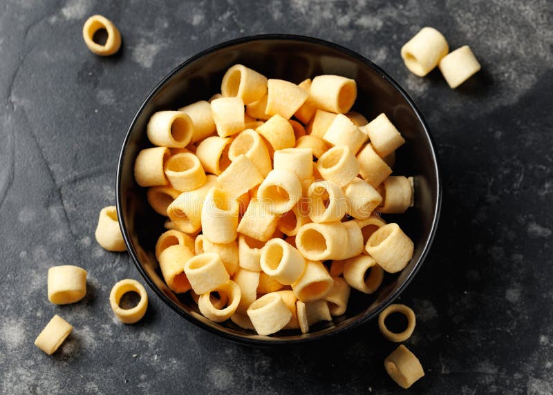 Crispy Potato Ring Chips in Black Bowls. Snack Food Stock Photo - Image ...