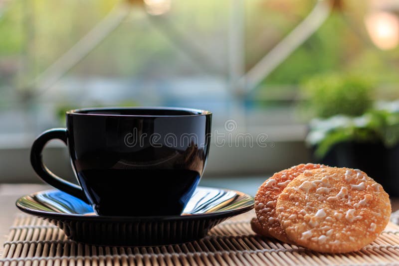 Crispy Rice Crackers with Hot Cup of Coffee on Wooden Table Back Stock ...