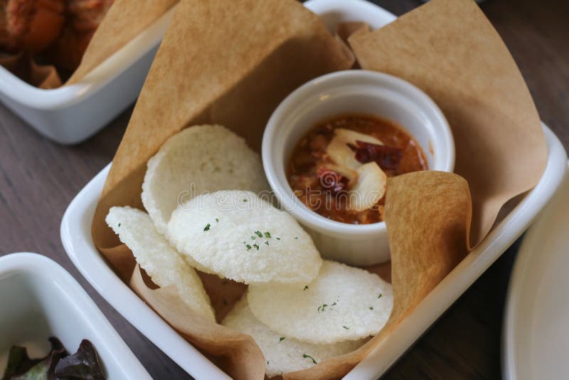 Crispy Rice Crust Pile with Sauce in White Plate. Stock Photo - Image ...