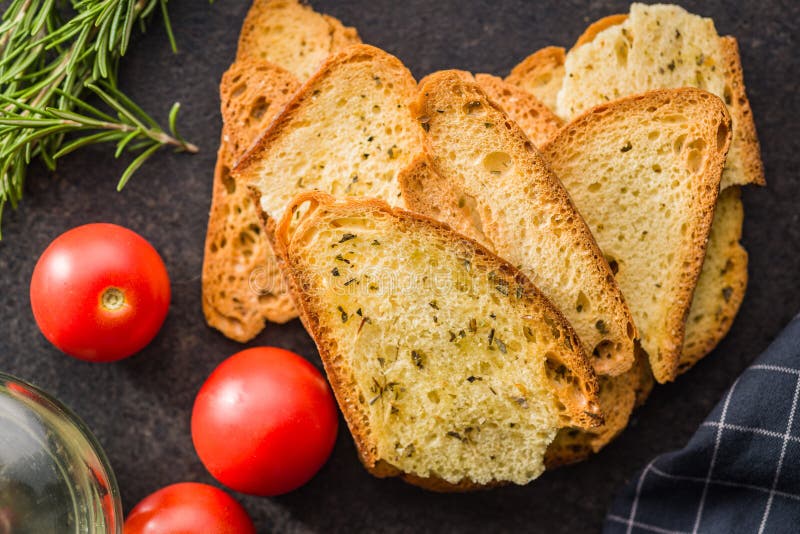 Crispy Roasted Bruschetta Bread on Black Table Stock Photo - Image of ...