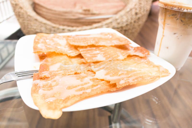 Crispy Roti with Sweetened Condensed Milk Stock Photo - Image of yummy ...