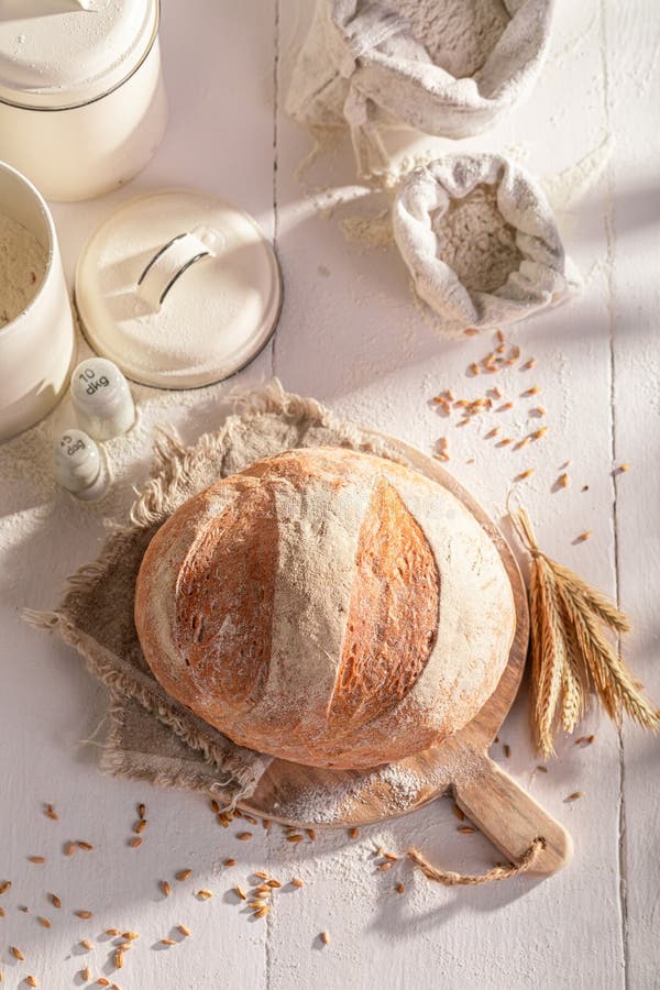 Crispy Round Loaf Bread Baked in a Bright Rustic Kitchen Stock Photo ...
