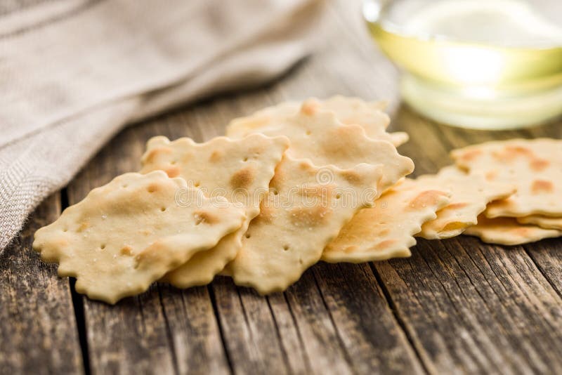 A Crispy Salted Crackers on Wooden Table Stock Photo - Image of crumb ...
